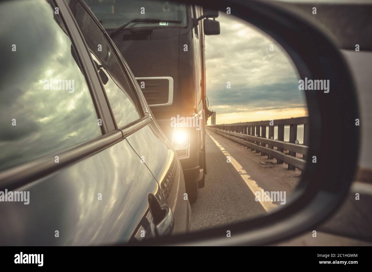 Reflection in the rear-view mirror of the car, the cargo with the ...