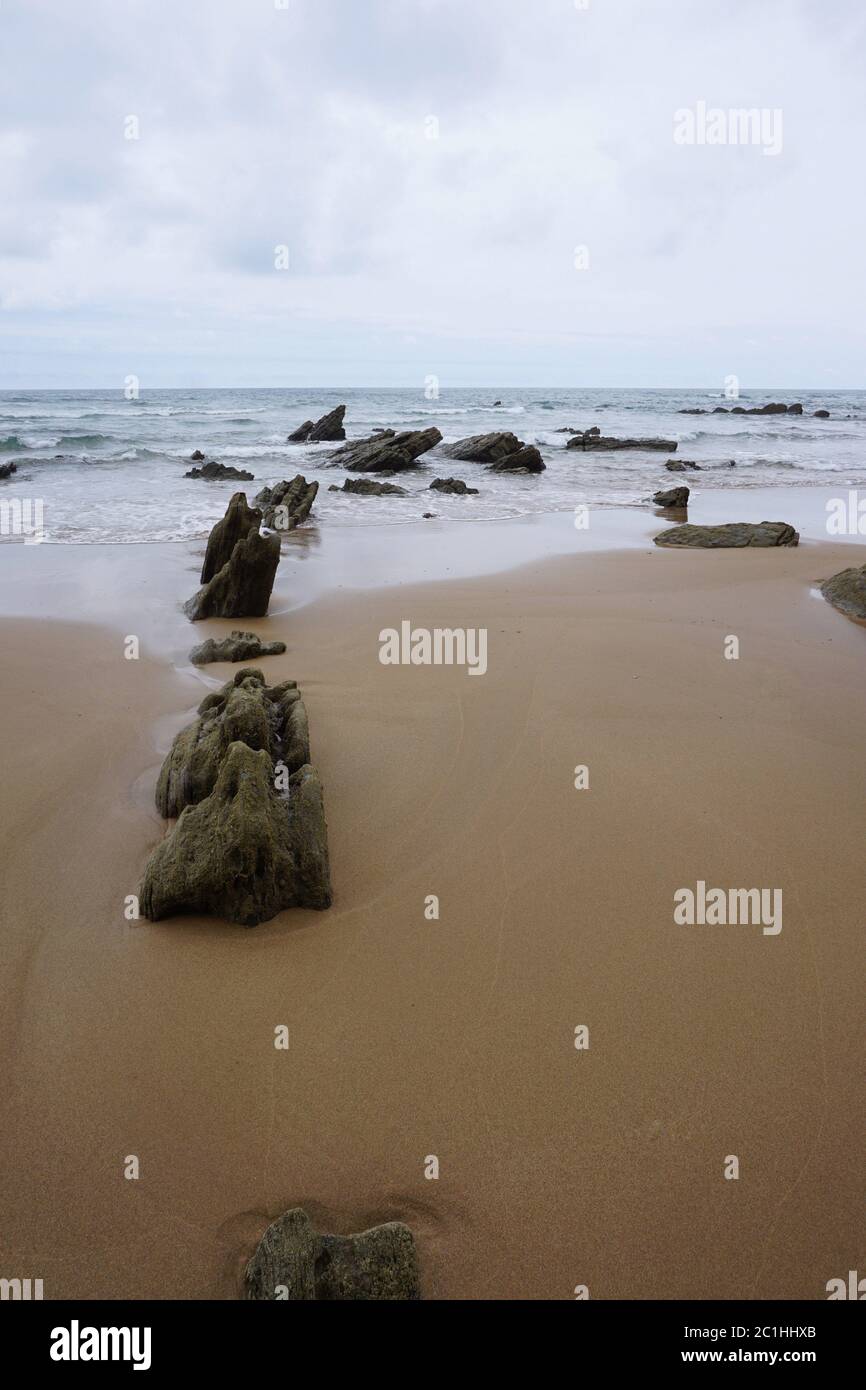 sand and rocks in the beach Stock Photo - Alamy