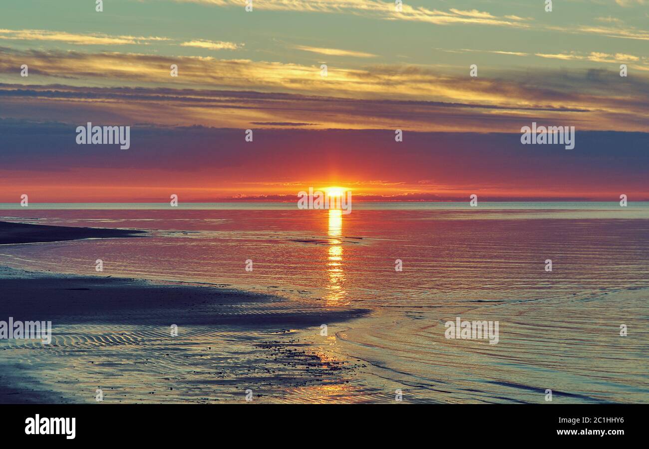 Sunset White Sea Stock Photo - Alamy