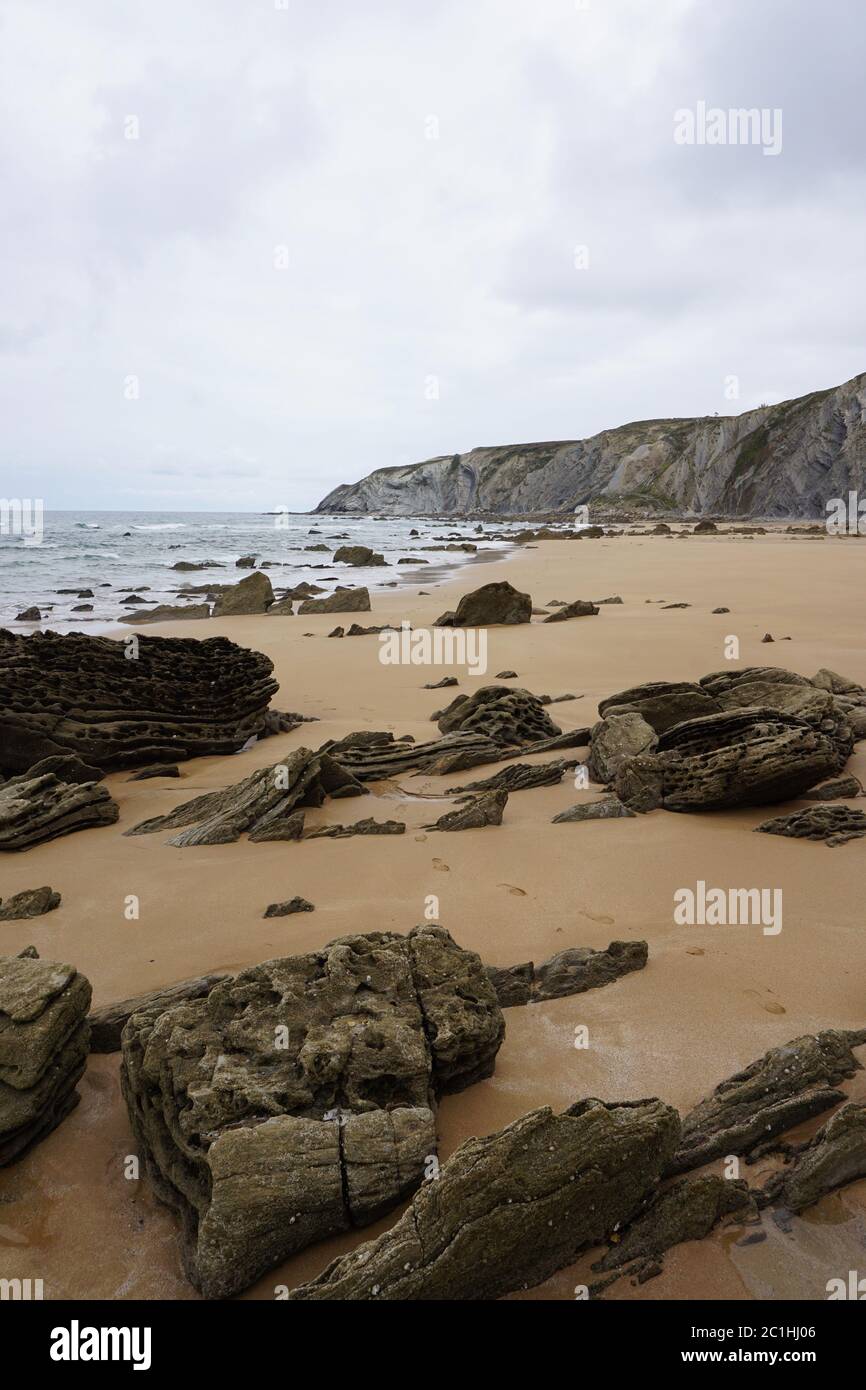 sand and rocks in the beach Stock Photo - Alamy