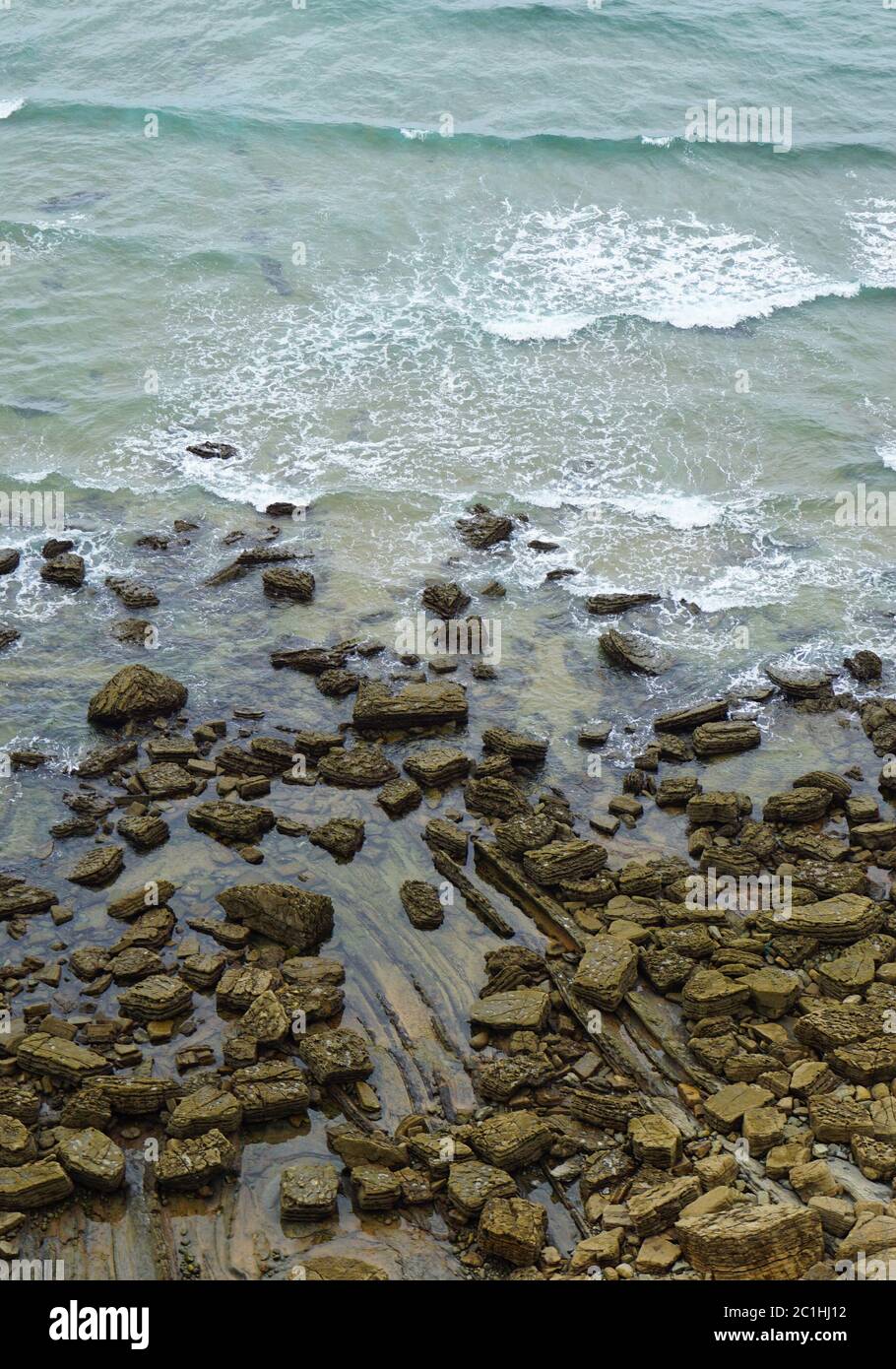 sand and rocks in the beach Stock Photo - Alamy