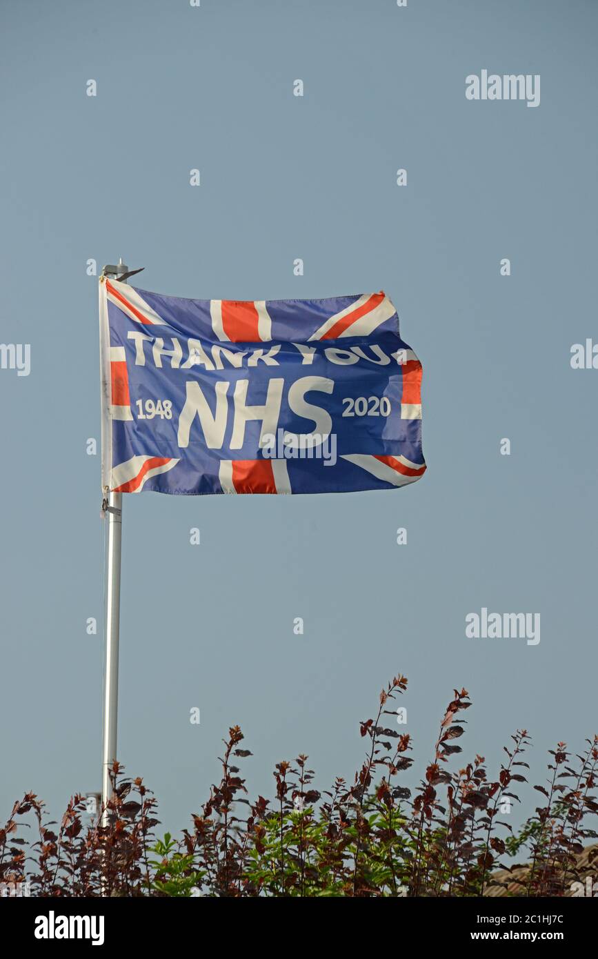 A THANK YOU NHS flag emblazoned on the Union Jack proudly unfurls in ...