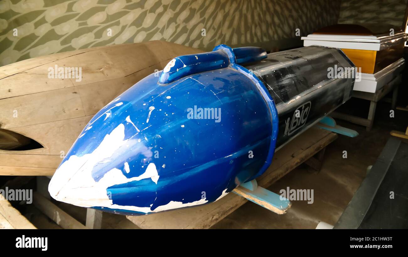 Funny traditional coffin in the shape of profession, pen, cancellarsi ...