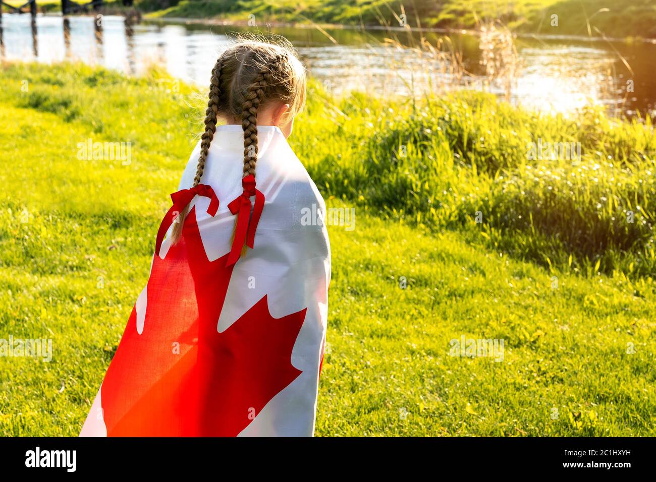 Happy Canda Day Celebrtation concept. Young cute female child with ...
