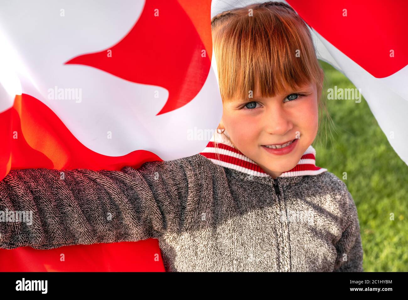 Happy Canda Day Celebrtation concept. Young cute female child with ...