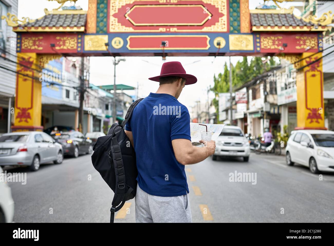 Traveler on city street Stock Photo - Alamy