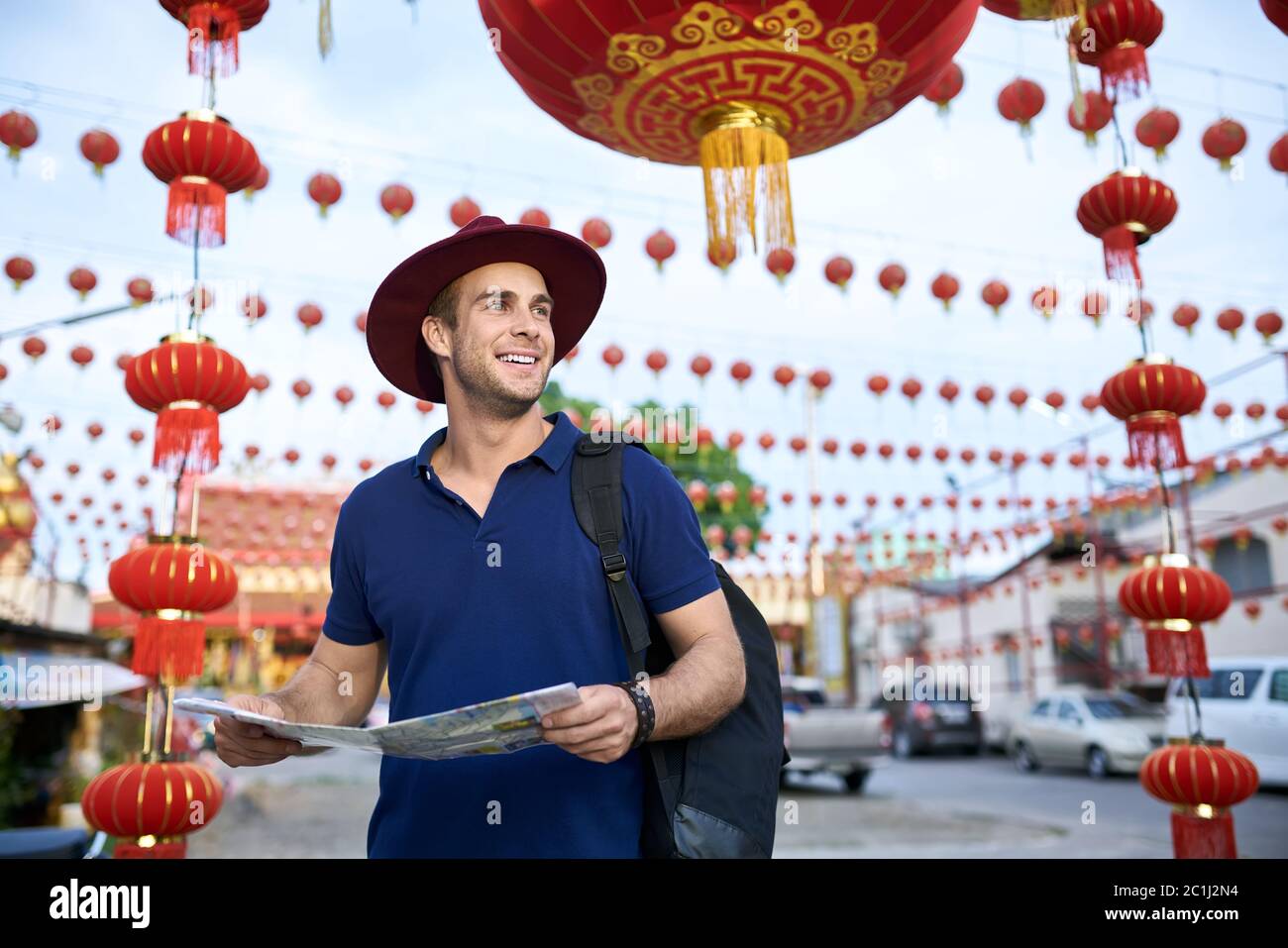 Traveler on city street Stock Photo - Alamy