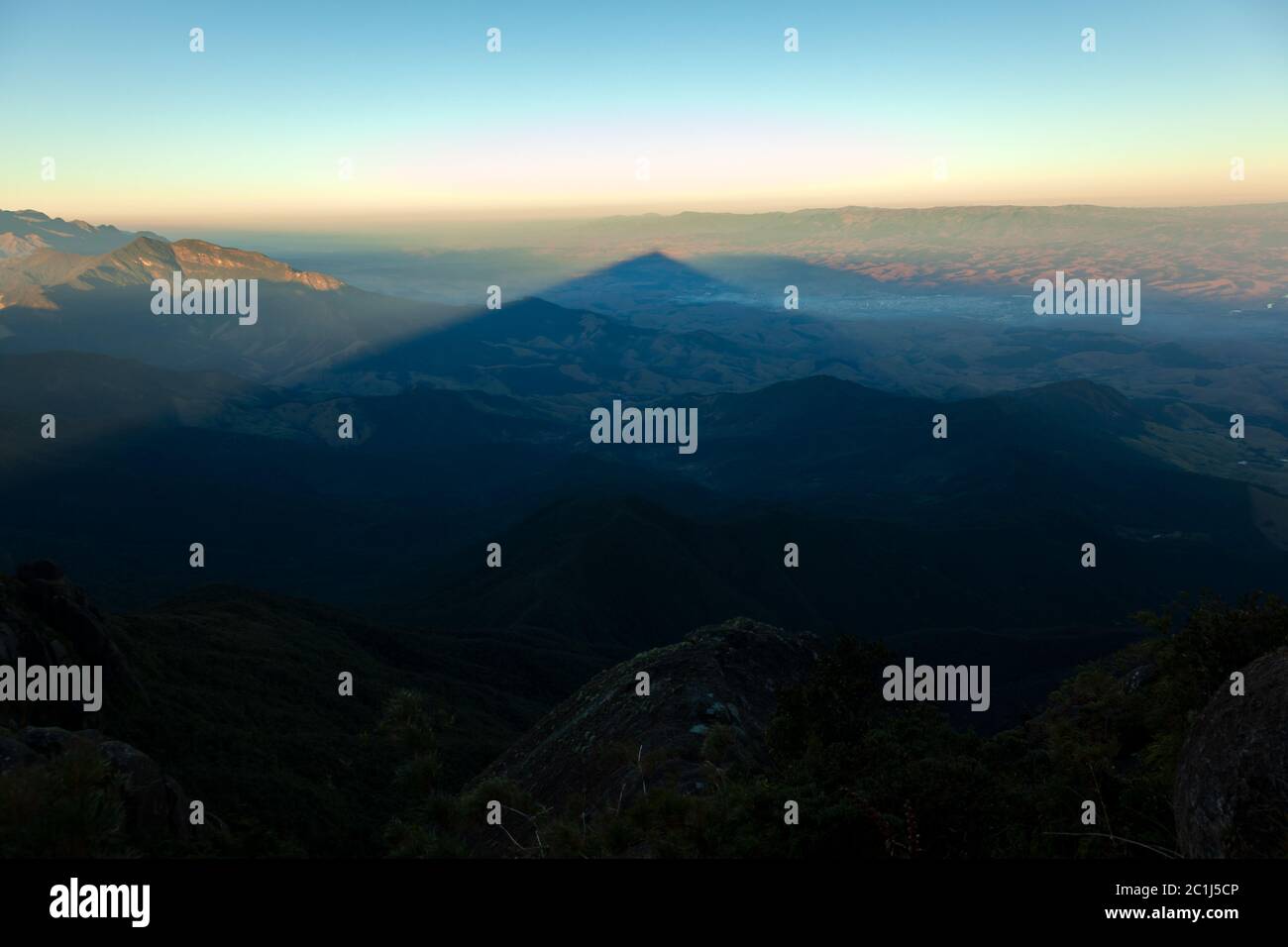 Triangular shadows of a mountain seen from the summit in mantiqueira ...