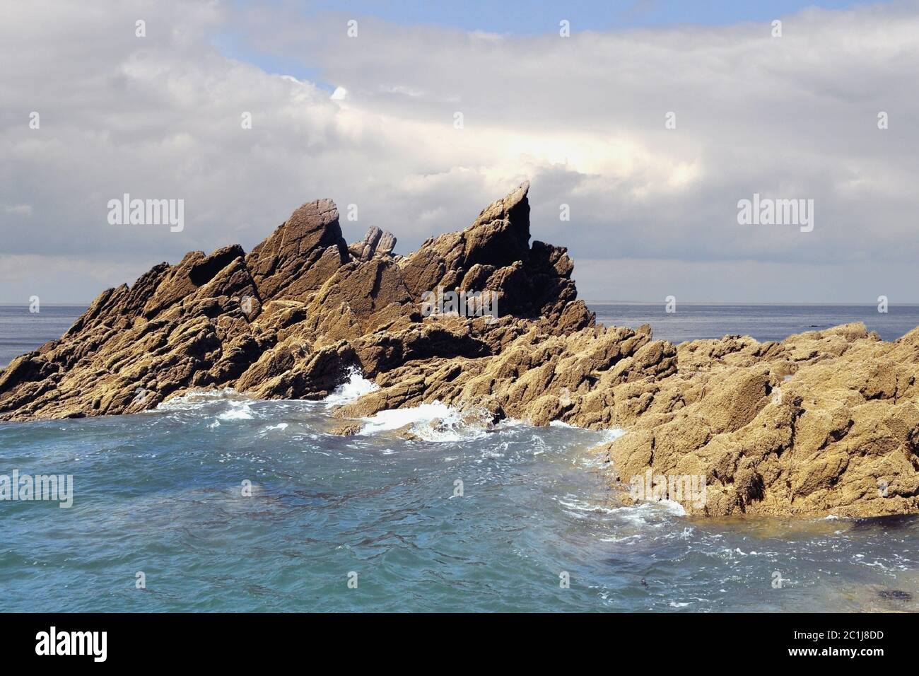 Rocky reef in the sea Stock Photo - Alamy
