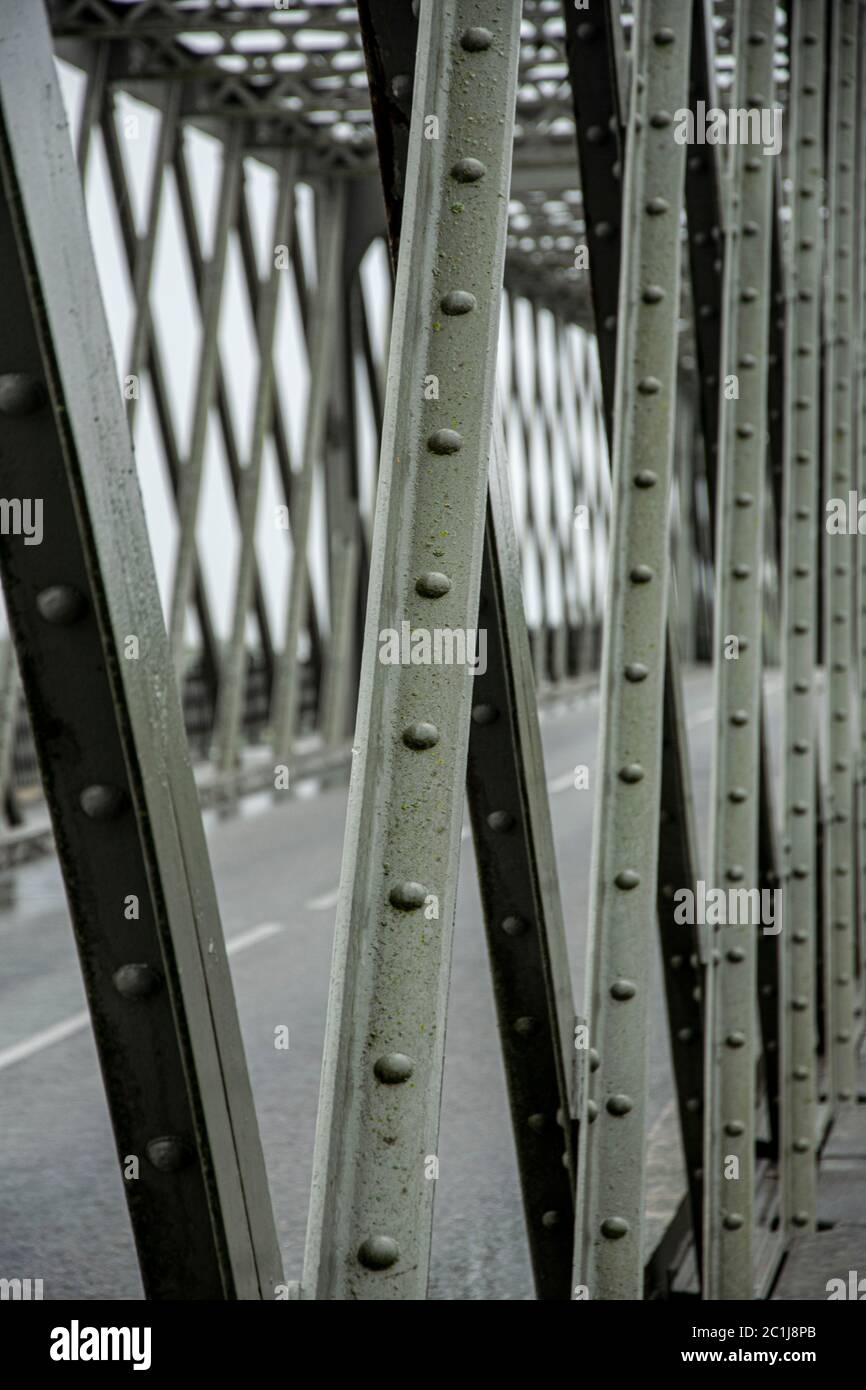 Metal frame bridge with large nuts Stock Photo - Alamy