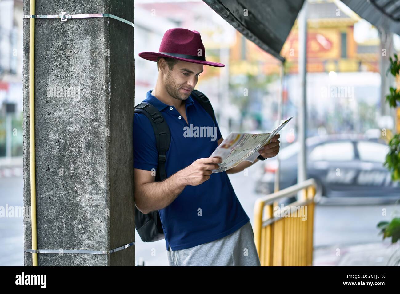 Traveler on city street Stock Photo - Alamy