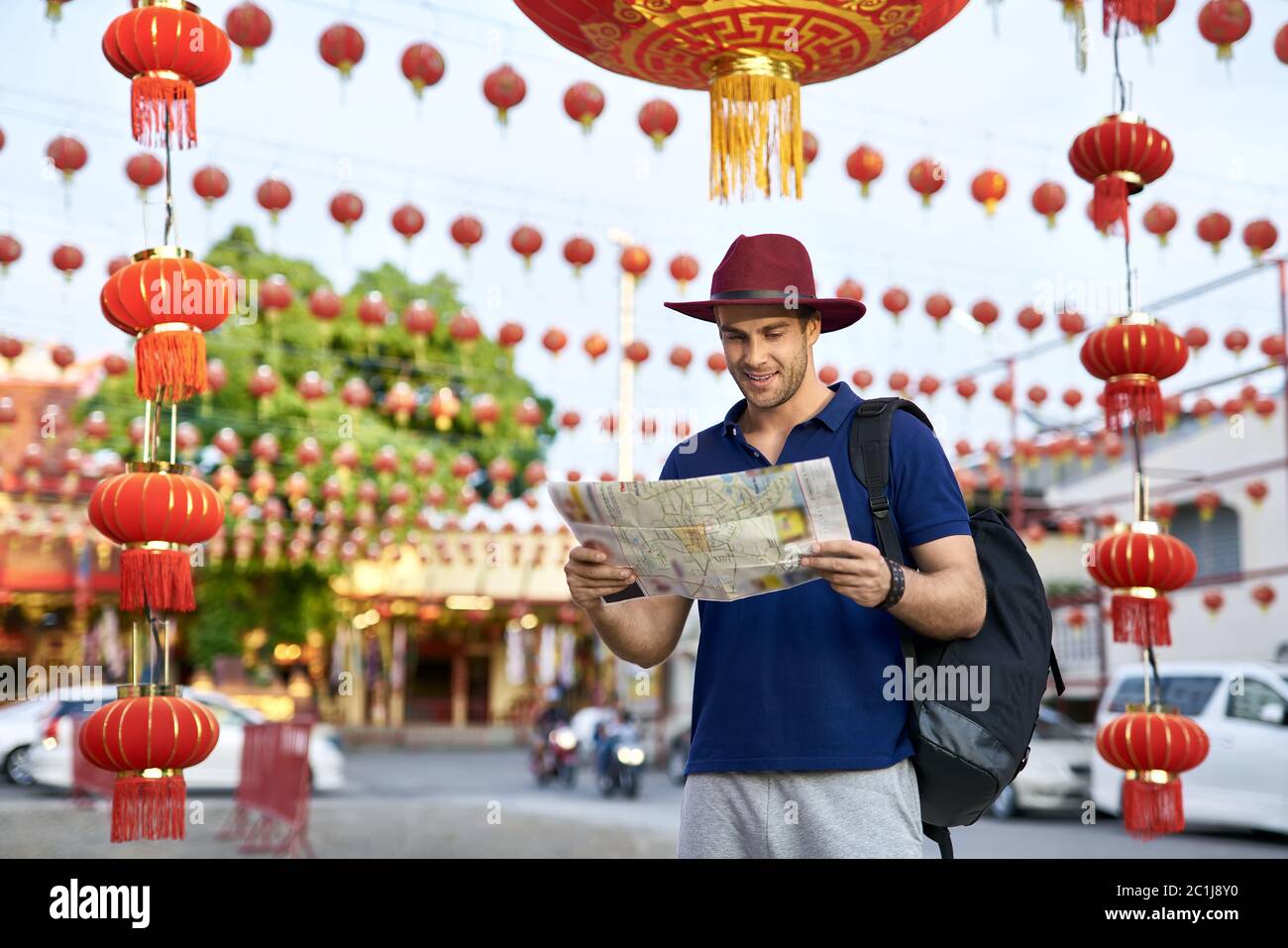 Traveler on city street Stock Photo - Alamy