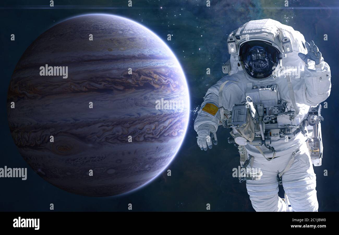 Jupiter and astronaut. Solar system. Science fiction Stock Photo - Alamy