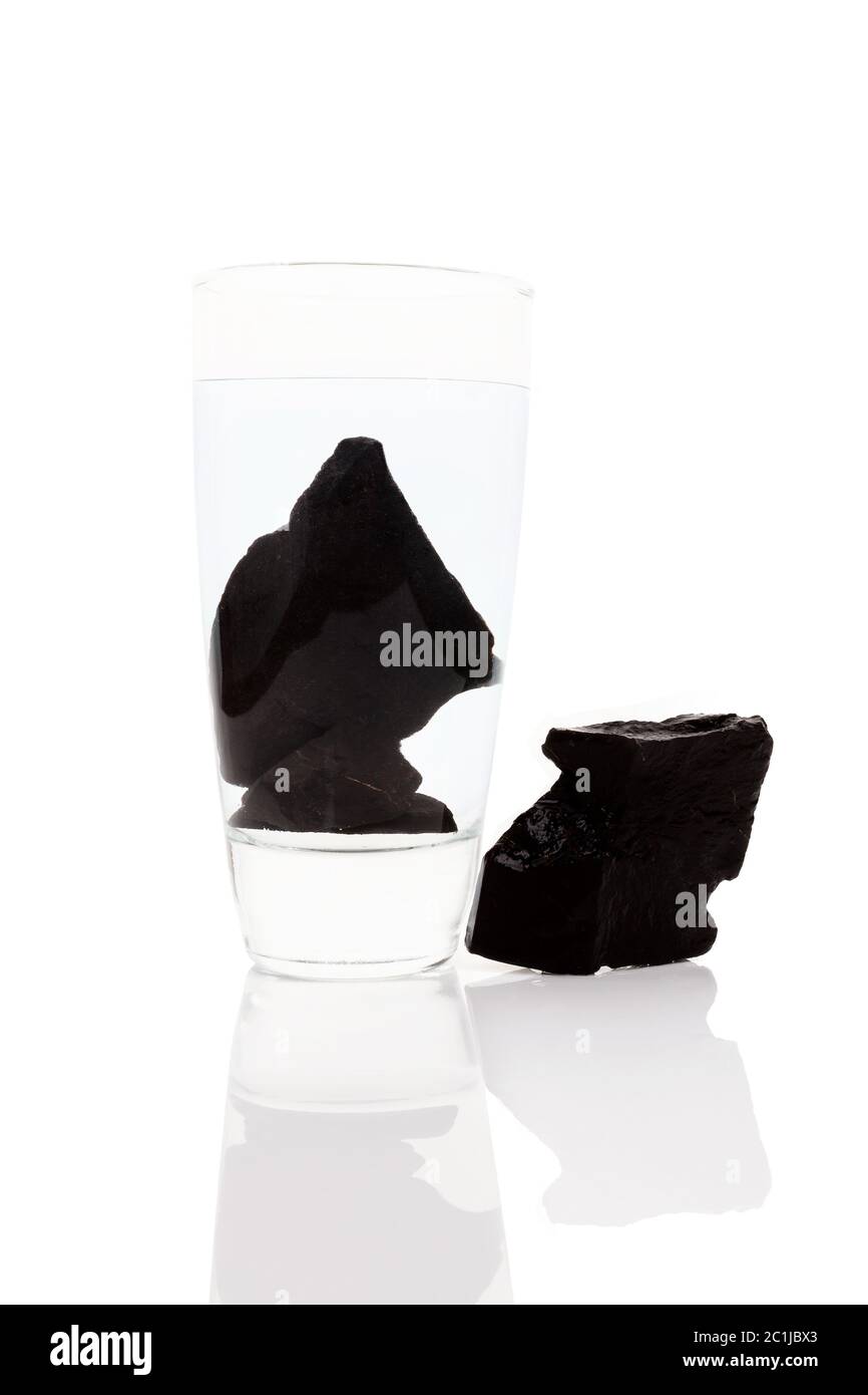 Shungite stone isolated Stock Photo - Alamy