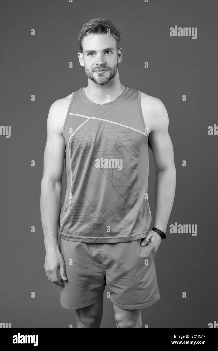 Sport clothes. Outfit for better results. Sportsman training with ...