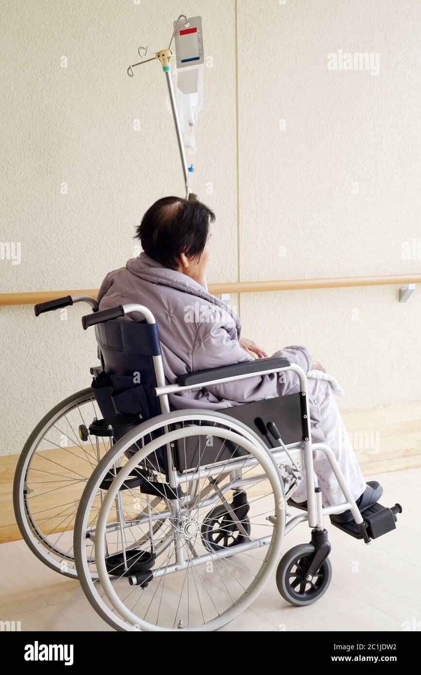 Sad people hospital hallway hi-res stock photography and images - Alamy