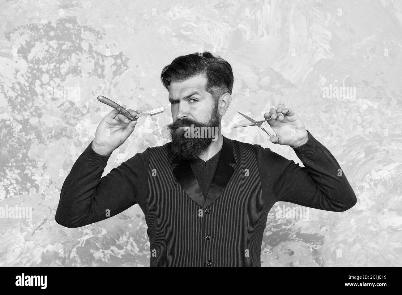 Bearded hipster shaving. bearded barber hold hairdressing tools. create ...