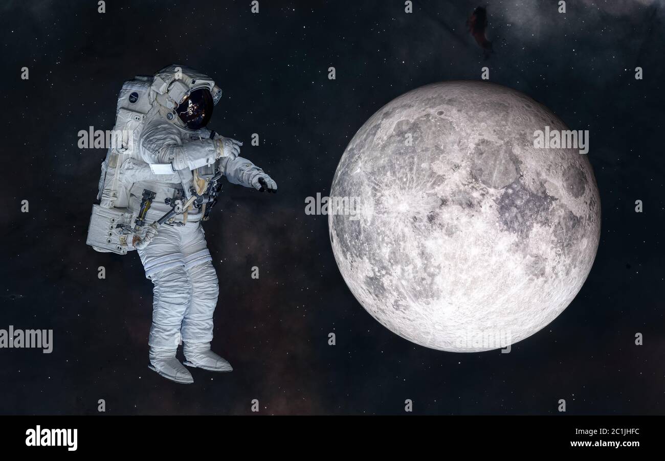 Astronaut and the Moon. Solar system. Science fiction Stock Photo - Alamy