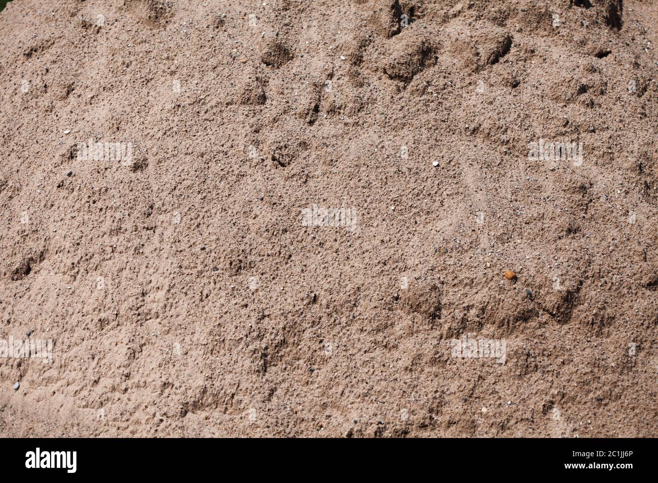 Rough sand texture in the bright sun Stock Photo - Alamy