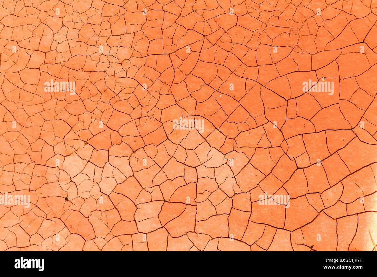 Orange drought soil pattern - no water Stock Photo - Alamy