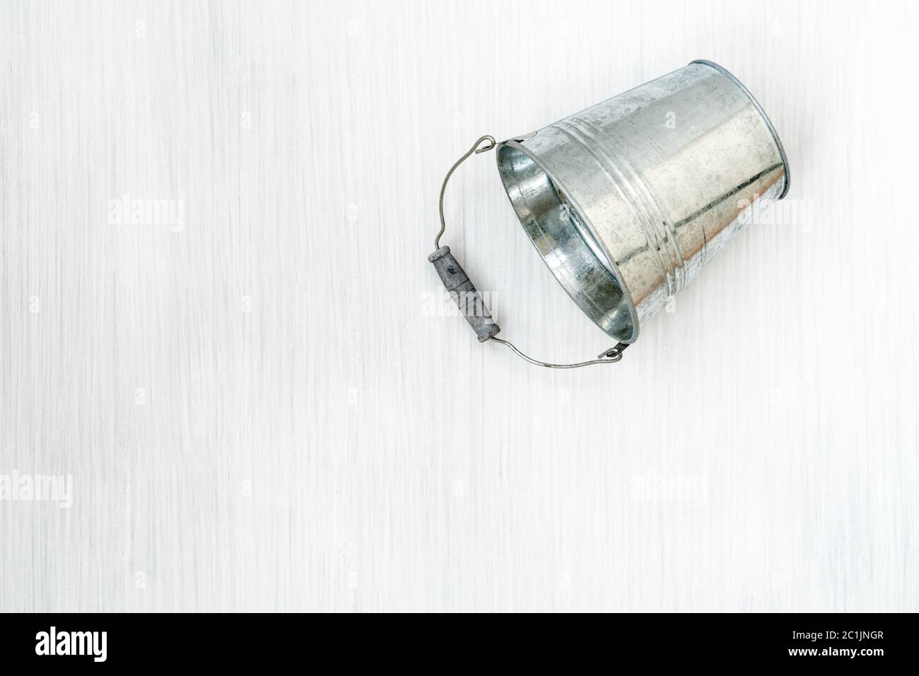 Empty metal bucket Stock Photo - Alamy