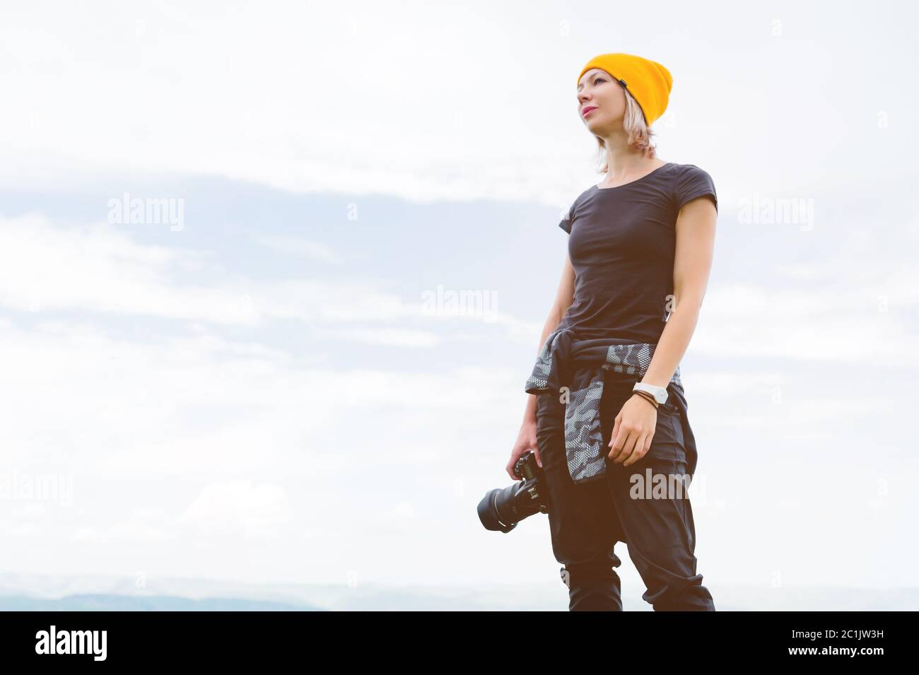 Girl standing with her back to camera hi-res stock photography and ...