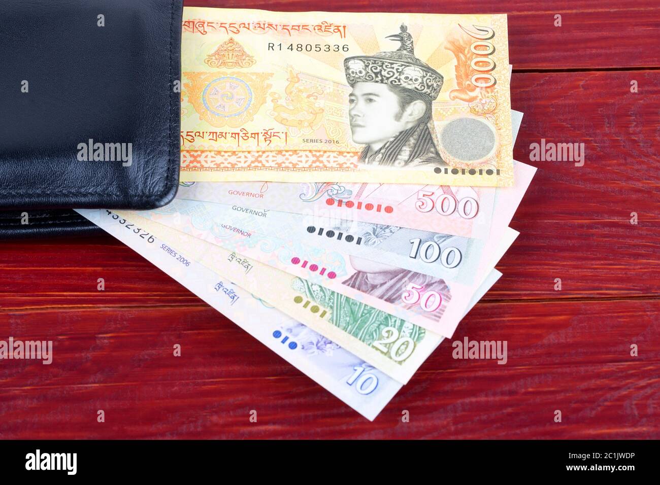 Bhutanese cash notes hi-res stock photography and images - Alamy