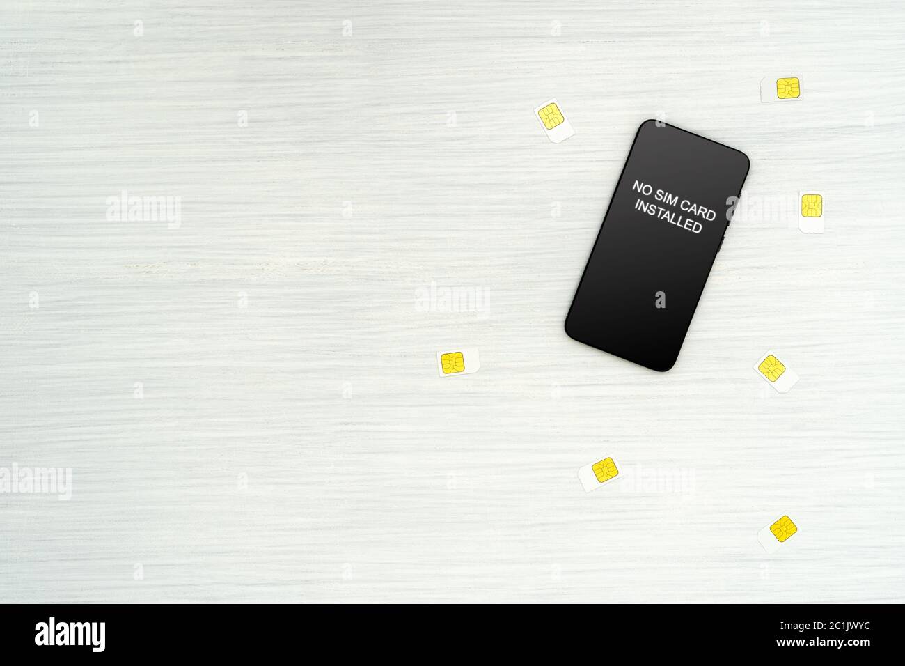 Switching SIM cards in smartphone Stock Photo - Alamy