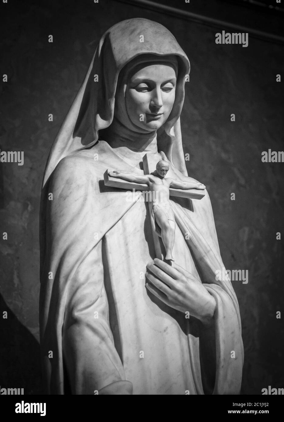 Ancient statue of the Virgin Mary withwoman statue crucifixion Stock ...