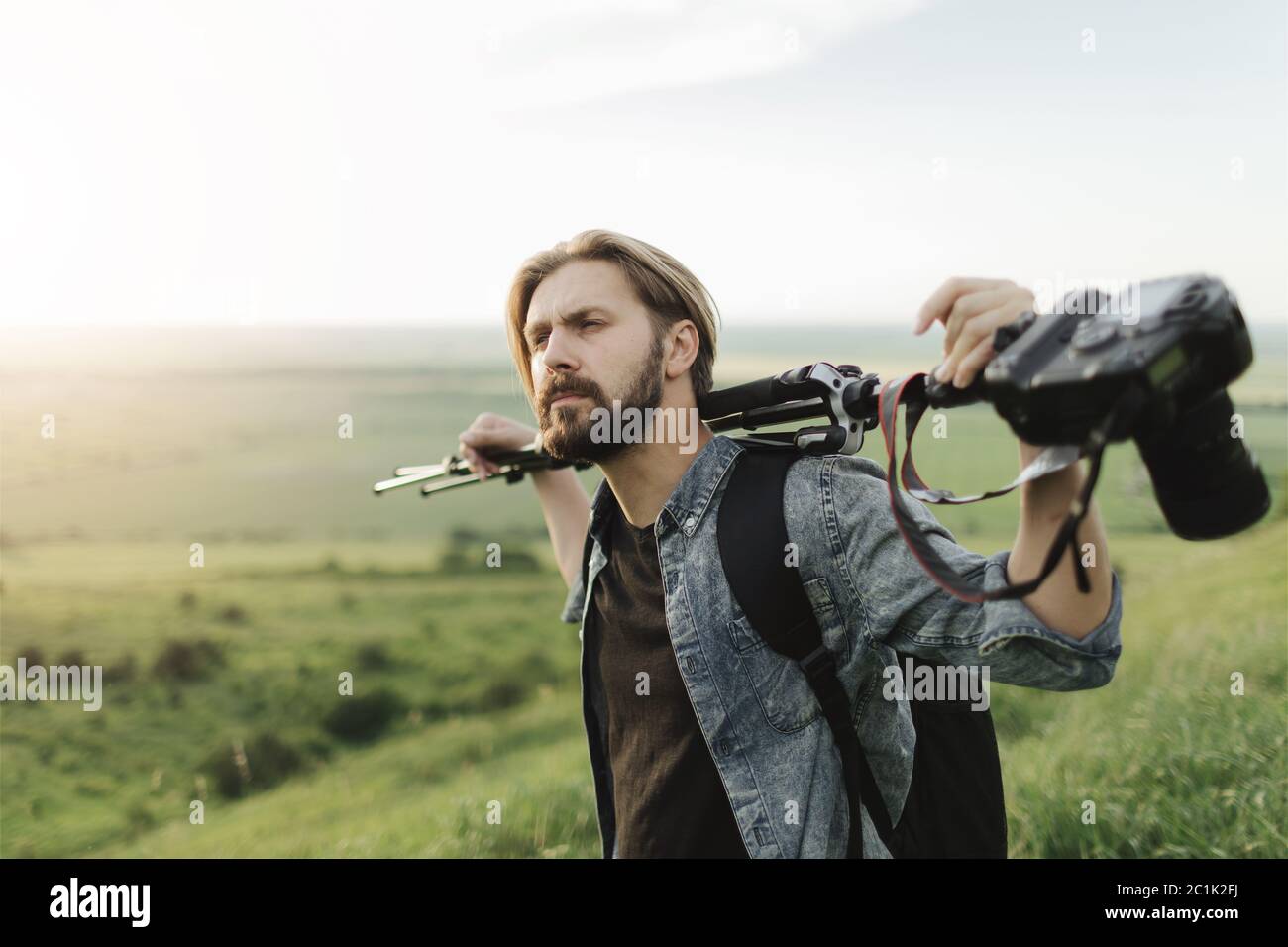 Man standing camera on tripod hi-res stock photography and images - Alamy