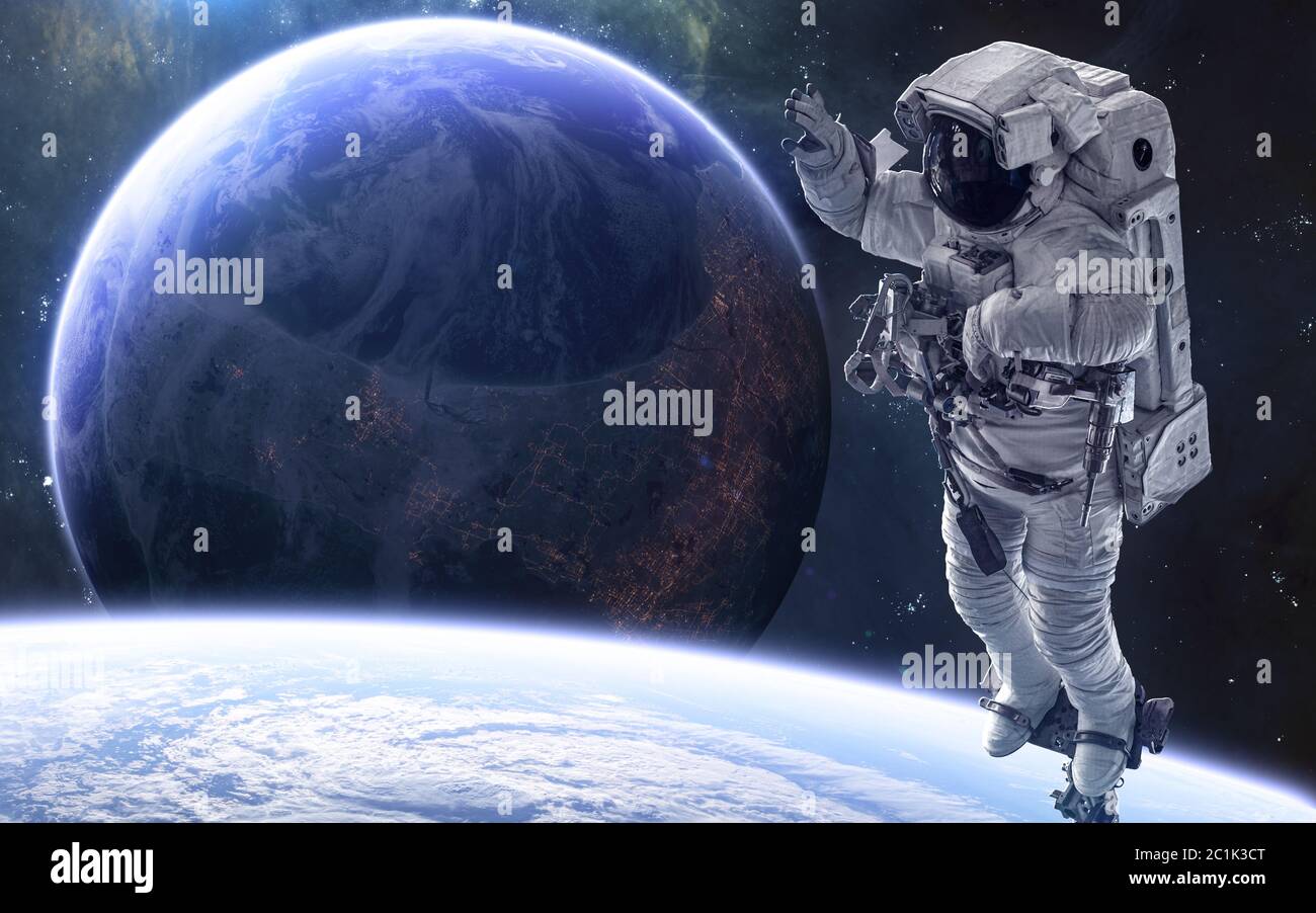 Inhabited planets, astronaut in deep space. Science fiction Stock Photo ...