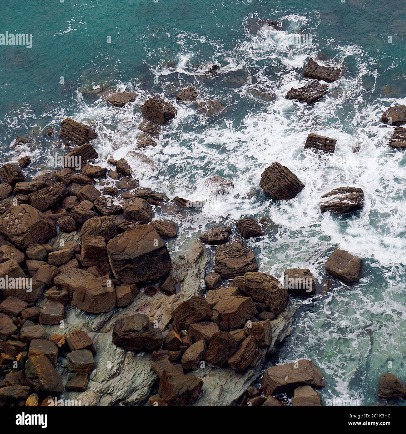 rock in the sea Stock Photo - Alamy