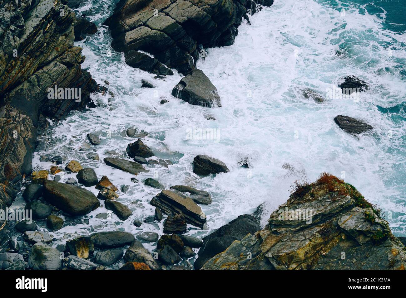 rock in the sea Stock Photo - Alamy