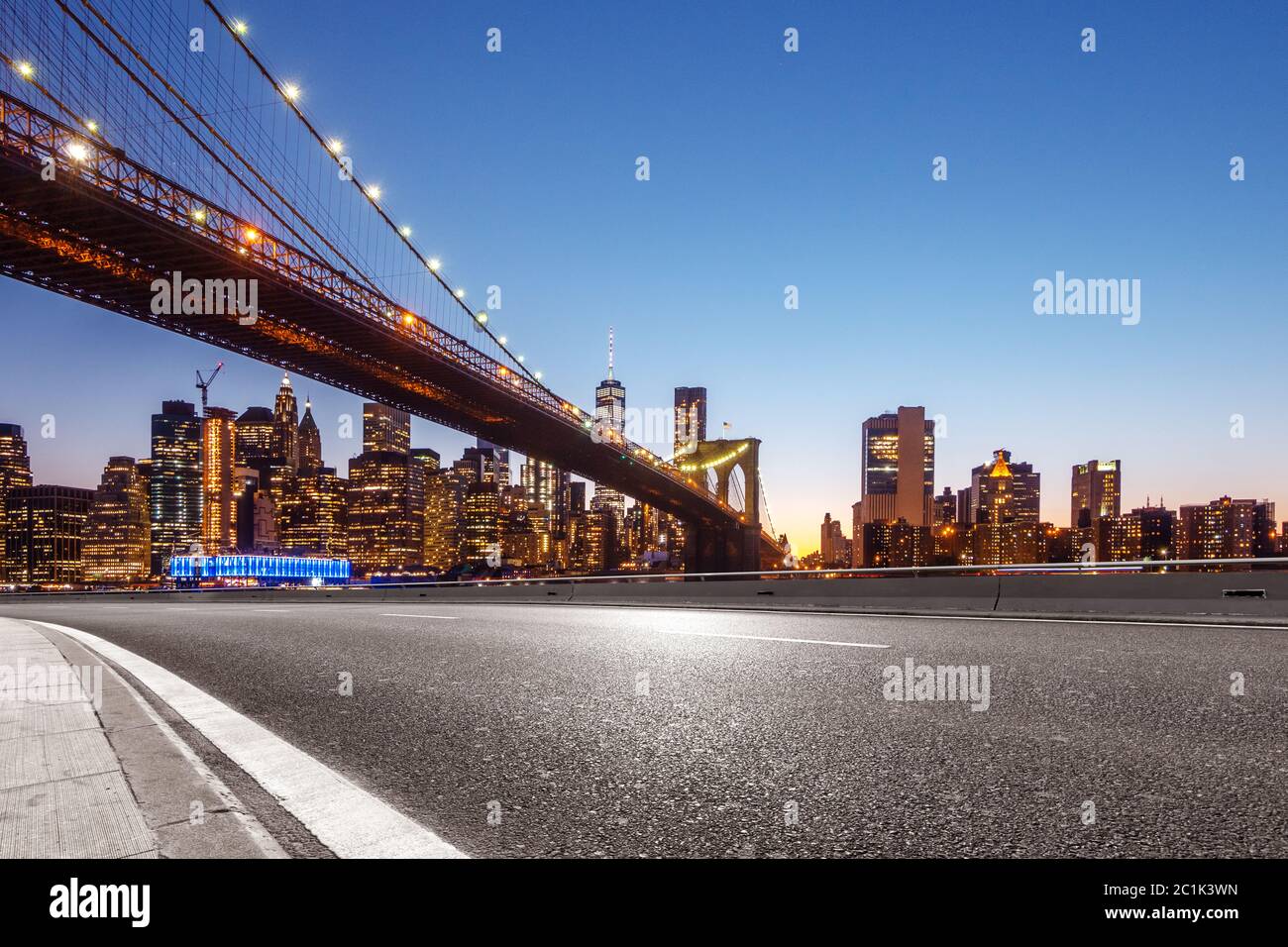 empty asphalt highway street with city skyline Stock Photo - Alamy