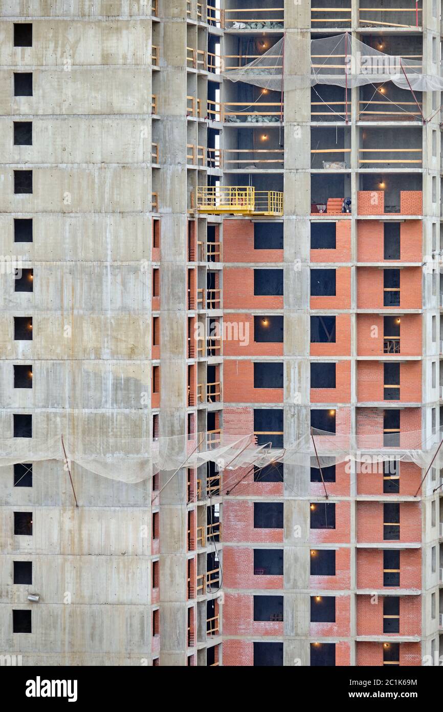 Construction of a high-rise residential modern house Stock Photo - Alamy