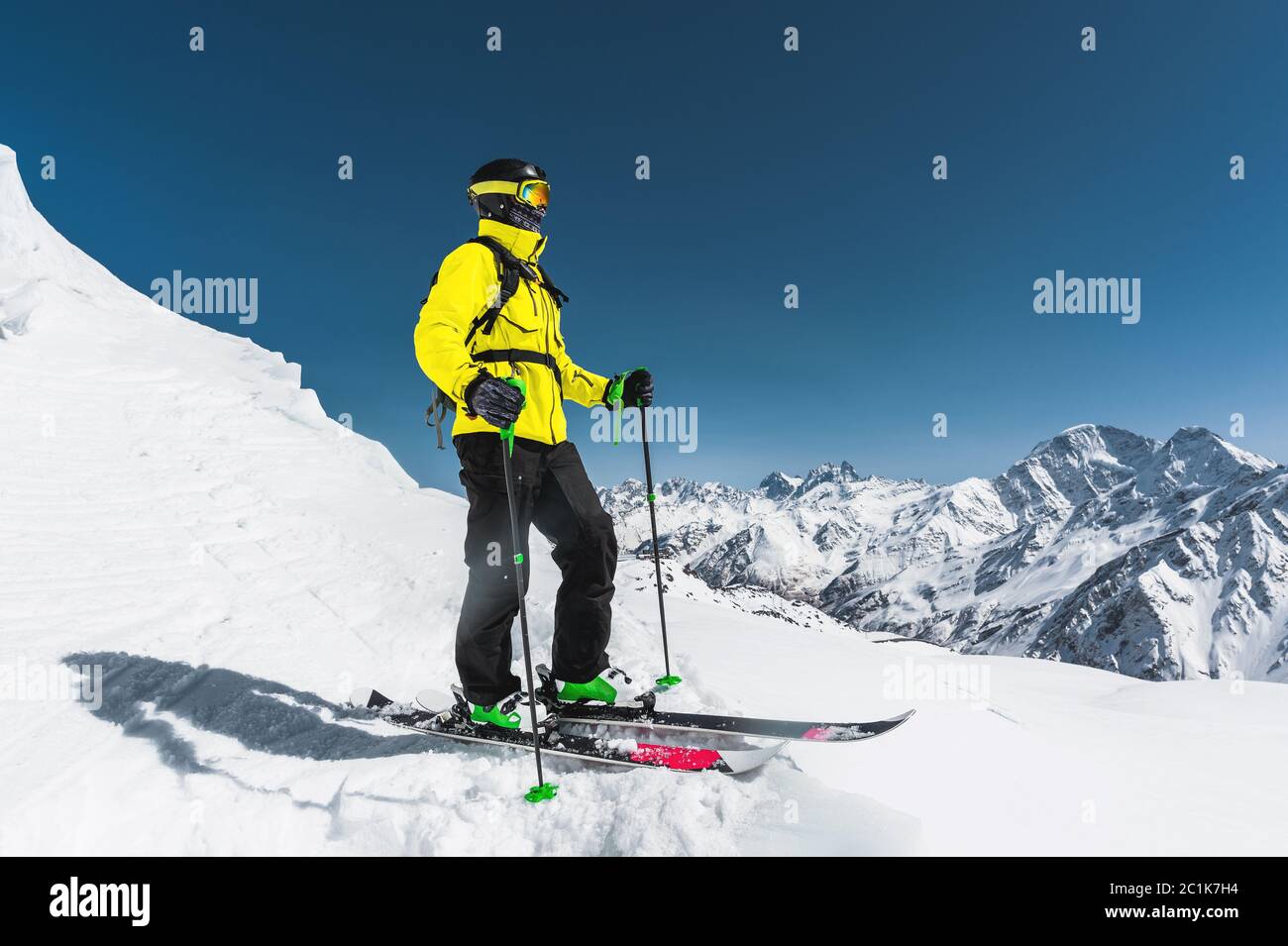 Male skier standing on slope hi-res stock photography and images - Alamy