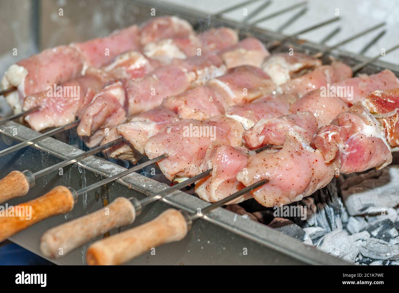 Pieces of meat prepare on fire Stock Photo - Alamy
