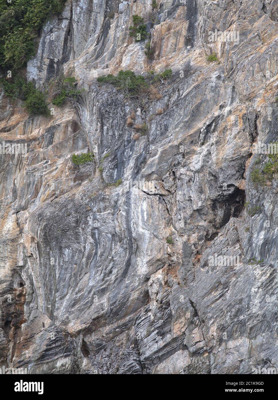Vertical cliff wall Stock Photo - Alamy