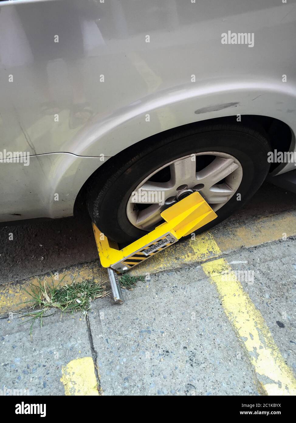 Parking claw on the car Stock Photo - Alamy