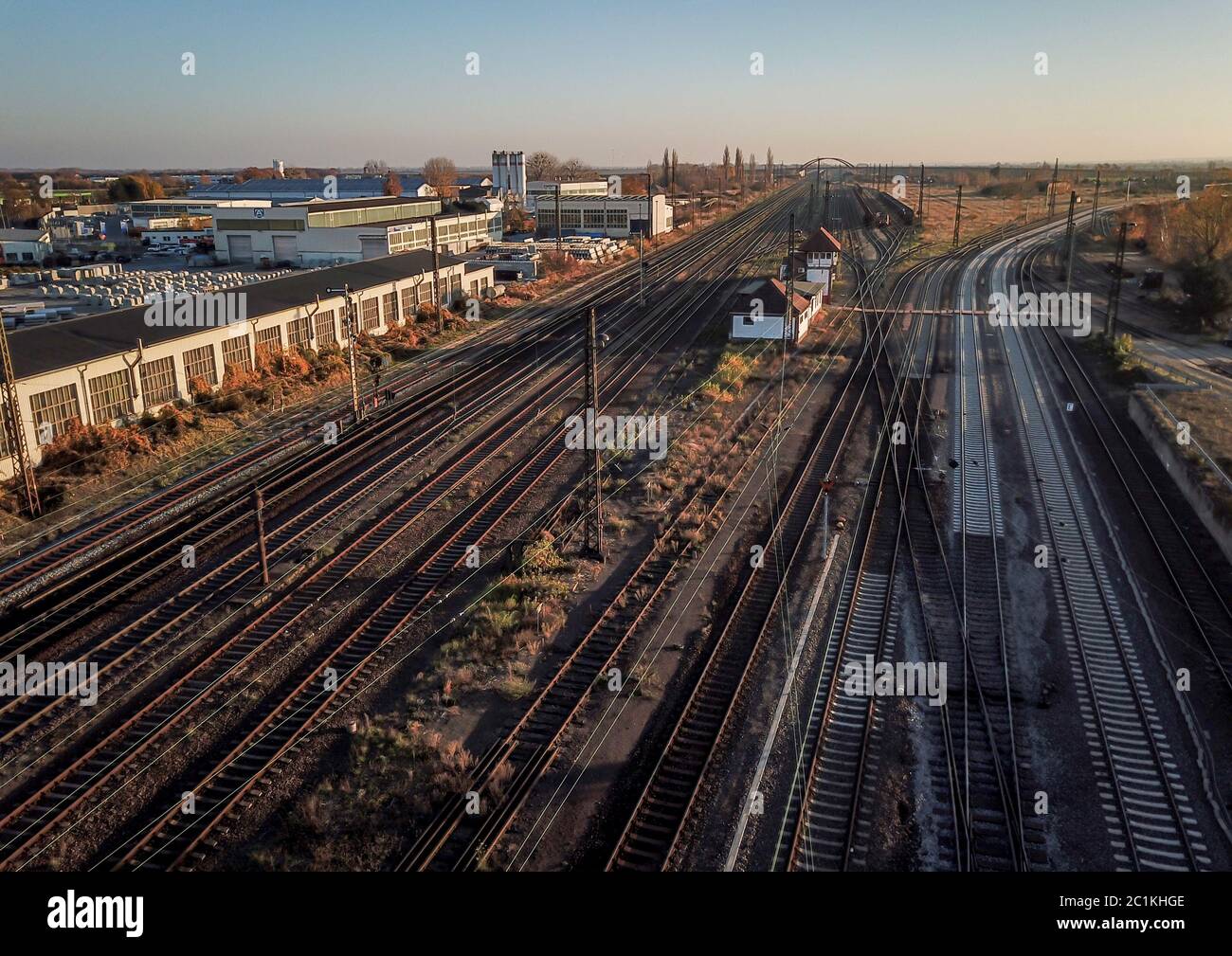 Infrastructure of track system with trains, switches, road bridges and ...