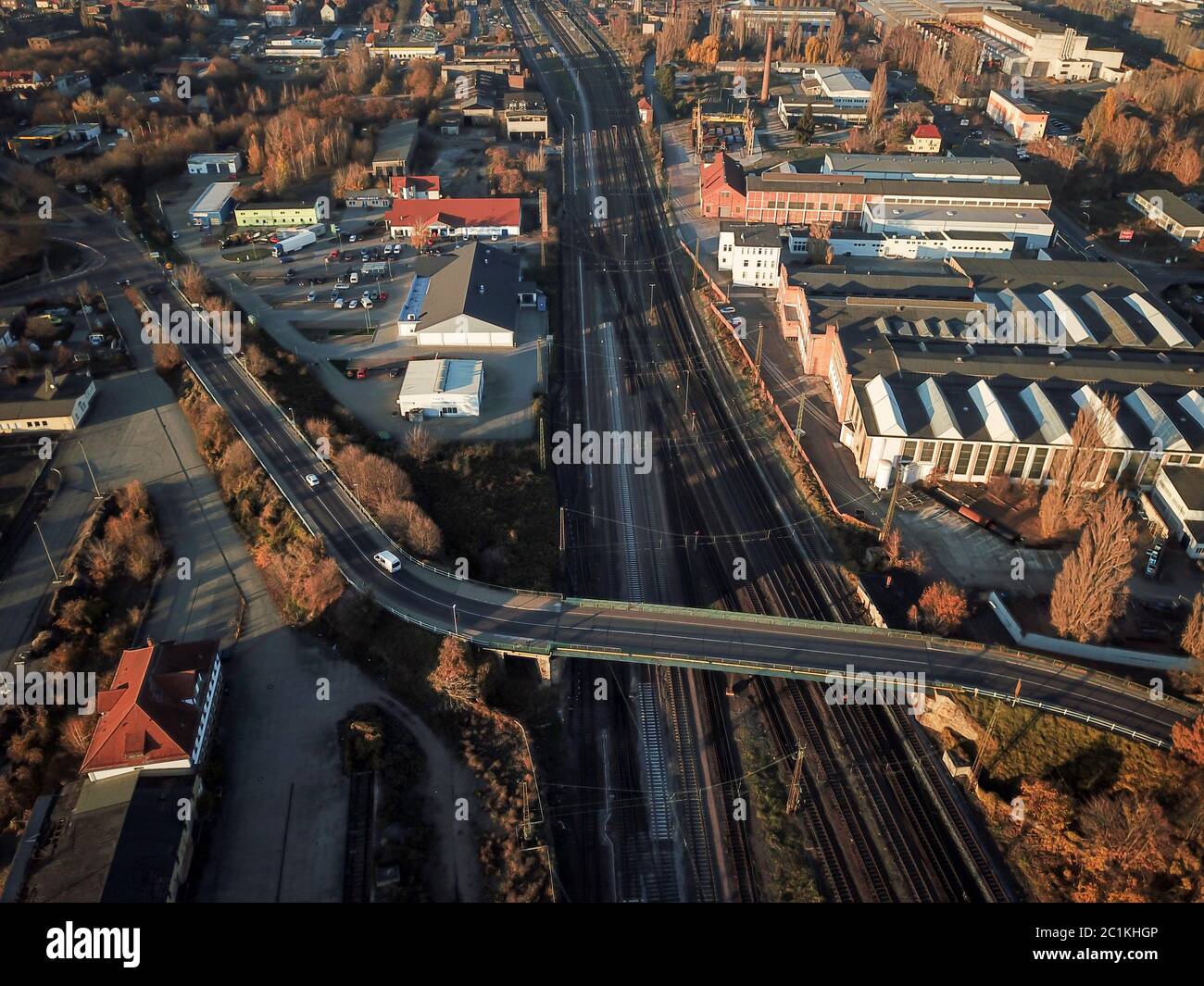 Infrastructure of track system with trains, switches, road bridges and ...