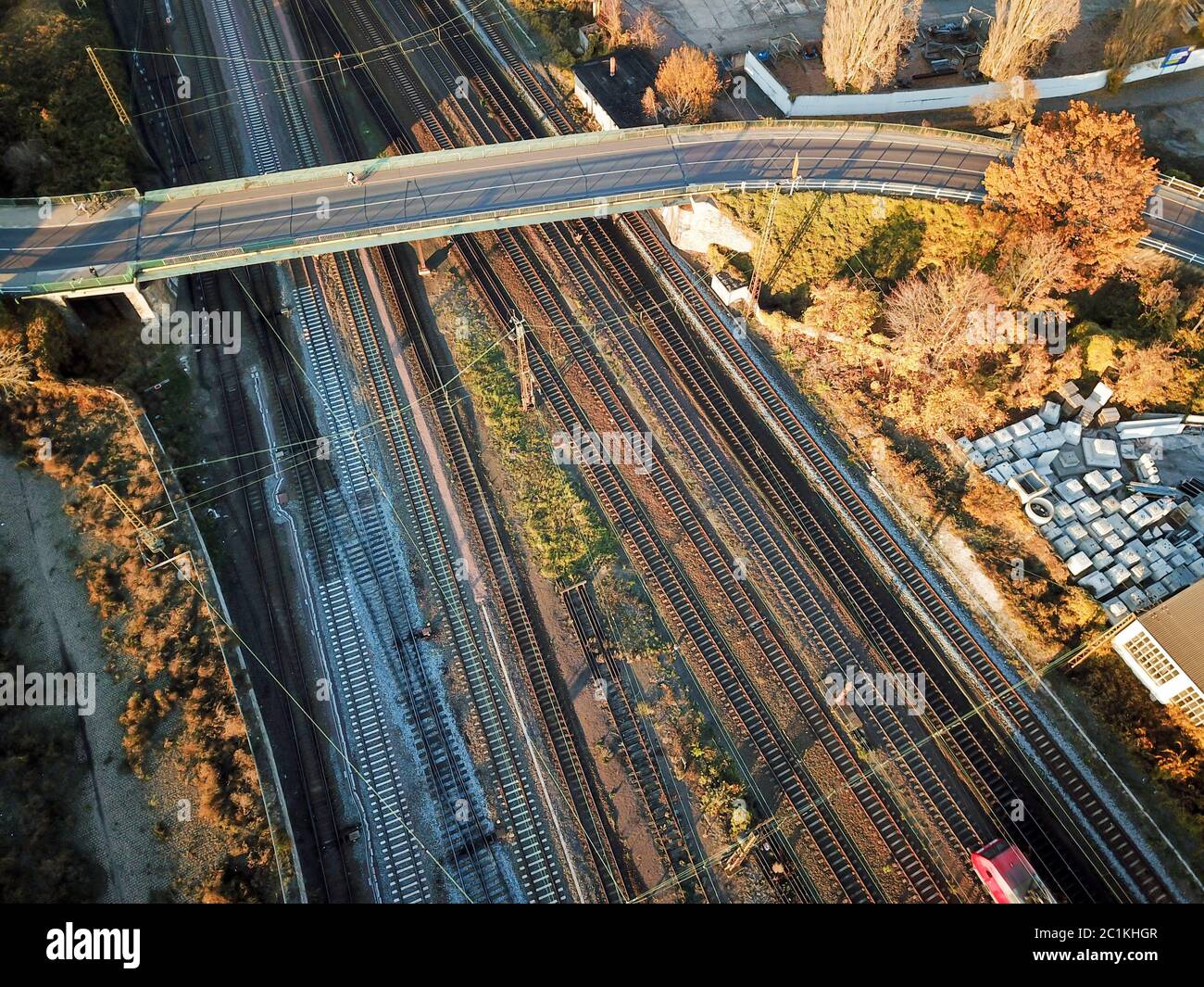 Infrastructure of track system with trains, switches, road bridges and ...