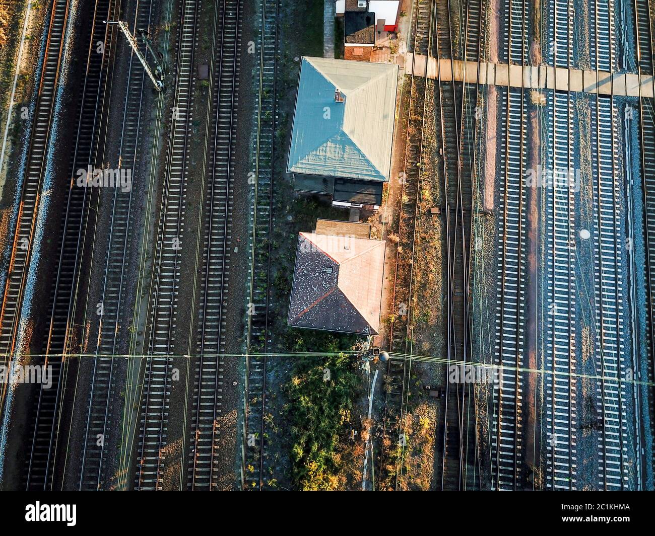 Infrastructure of track system with trains, switches, road bridges and ...