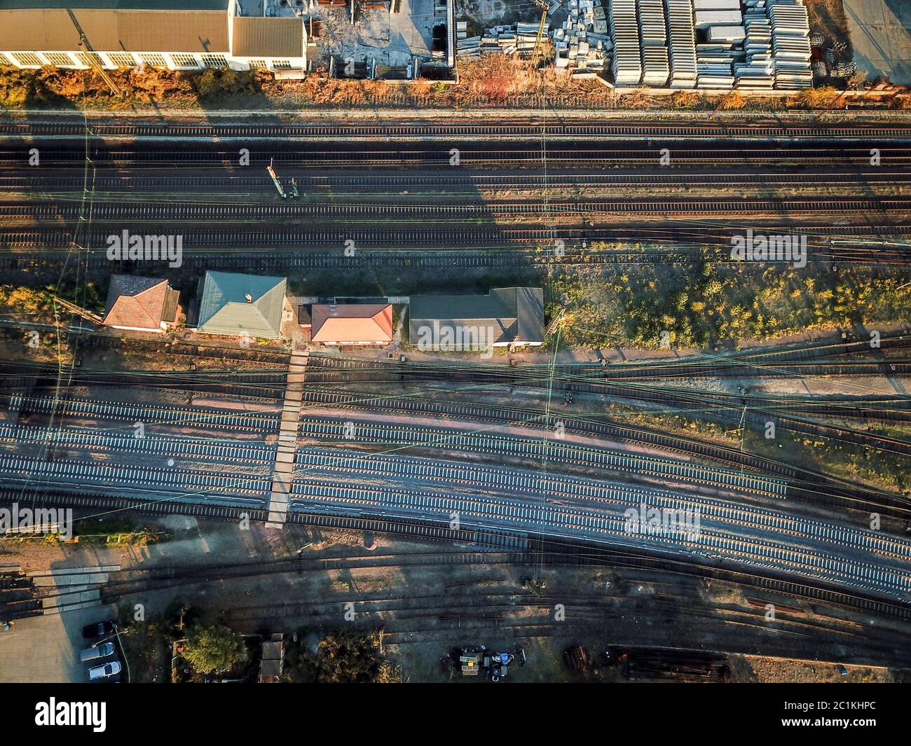 Infrastructure of track system with trains, switches, road bridges and ...