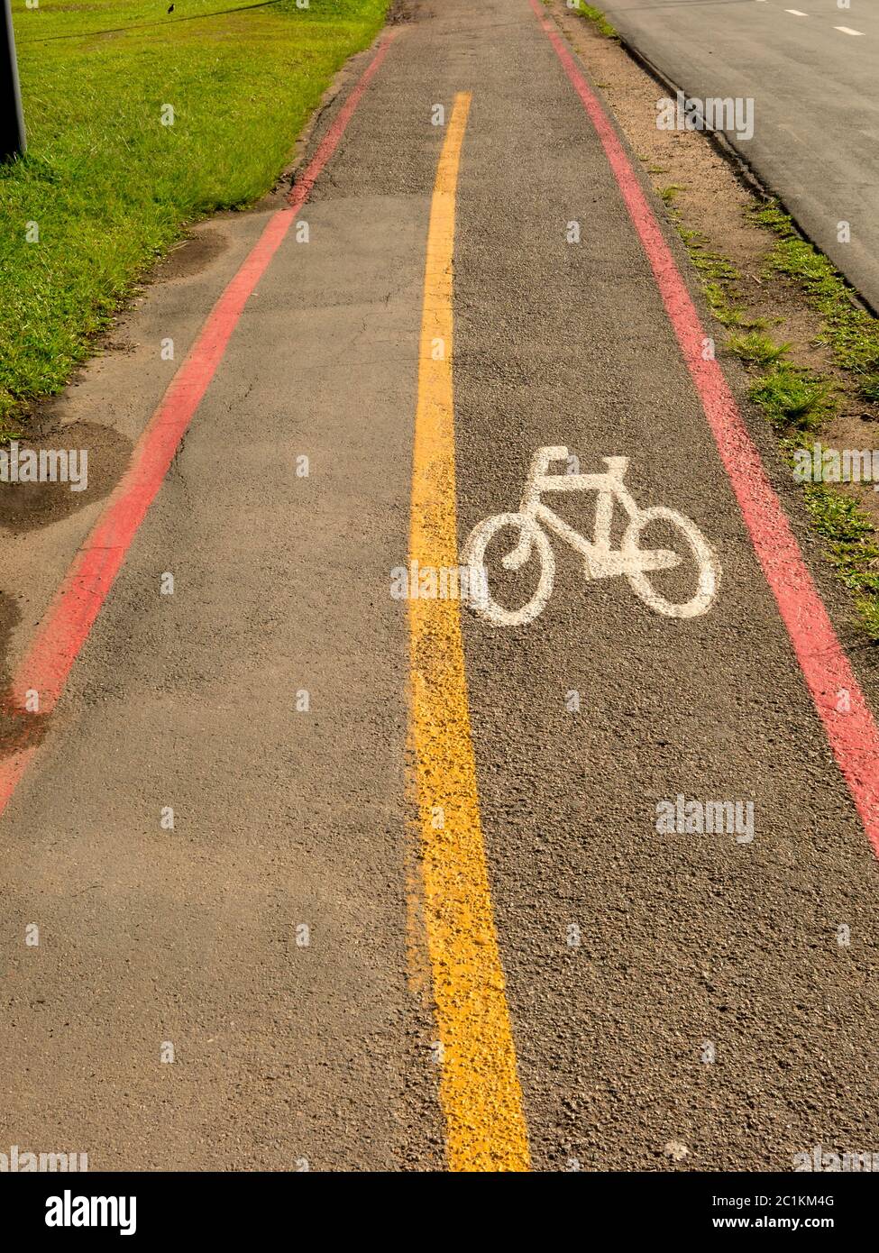 Bike Lane signs on streets ground Stock Photo - Alamy