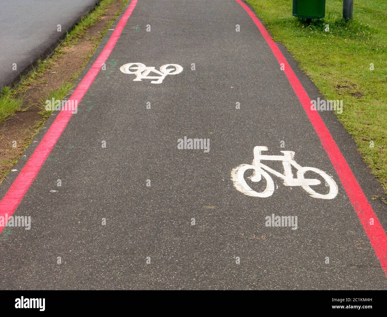 Bike Lane signs on streets ground Stock Photo - Alamy