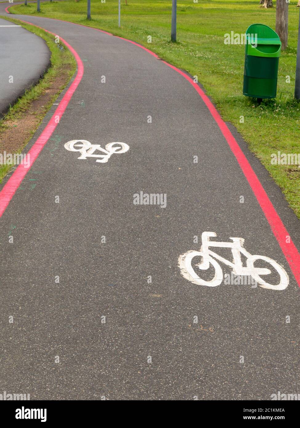 Bike Lane signs on streets ground Stock Photo - Alamy