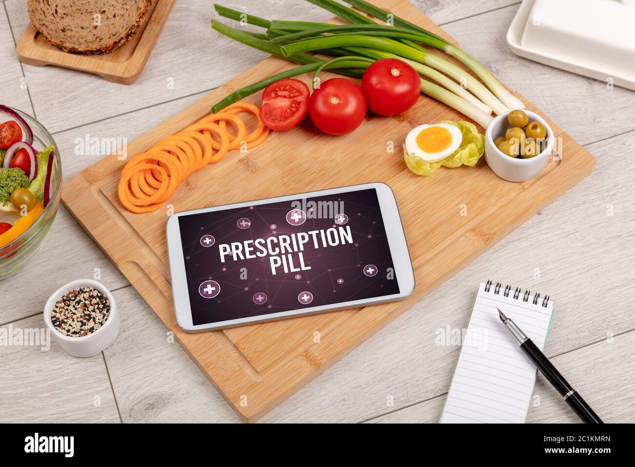 PRESCRIPTION PILL concept in tablet pc with healthy food around, top ...