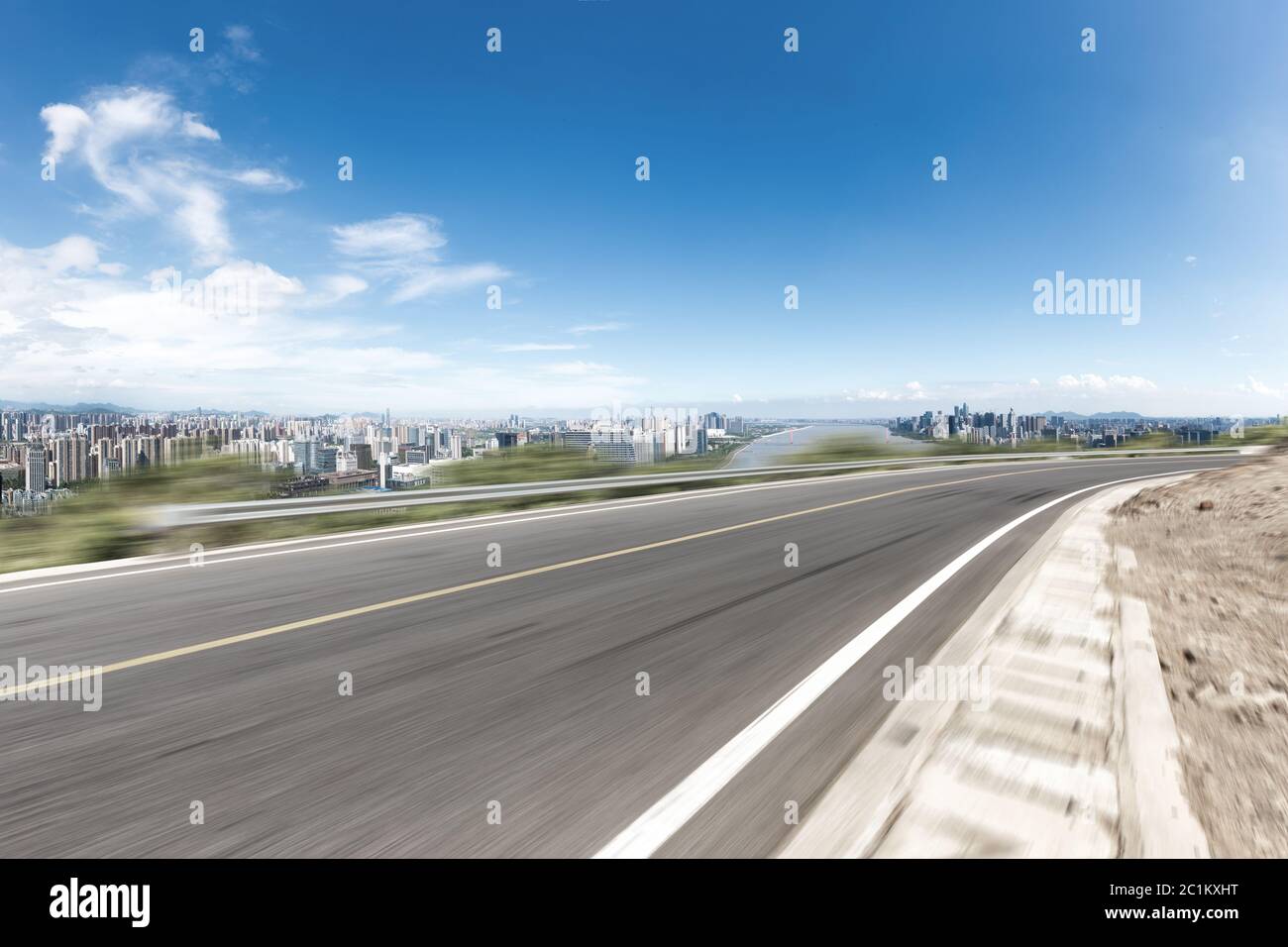 empty asphalt highway through modern city Stock Photo - Alamy
