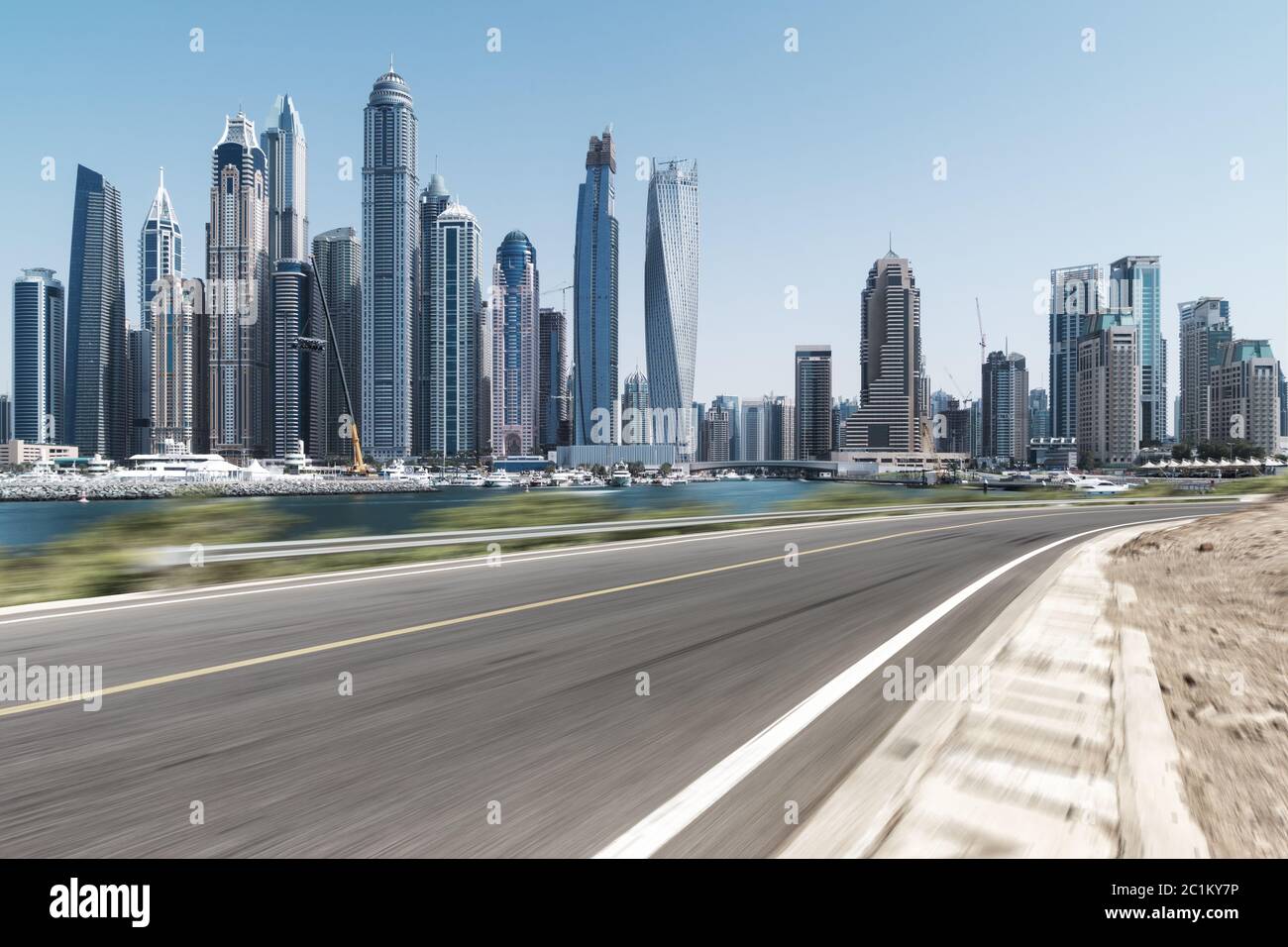 empty asphalt highway through modern city Stock Photo - Alamy